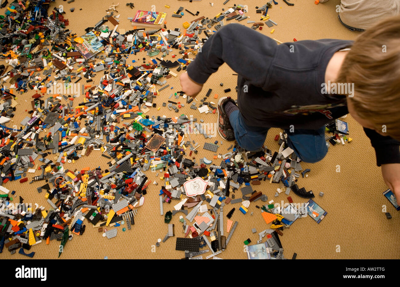 child running across floor with lego building block Stock Photo - Alamy