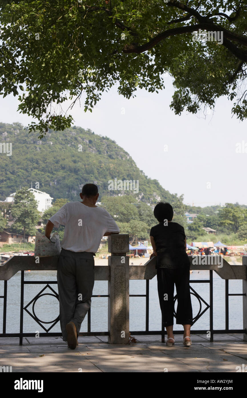 People Standing On Riverside Promenade, Guilin, Guangxi, China Stock ...