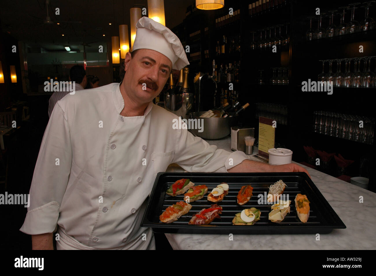 Cook with typical Tapas snack food Spain Stock Photo - Alamy