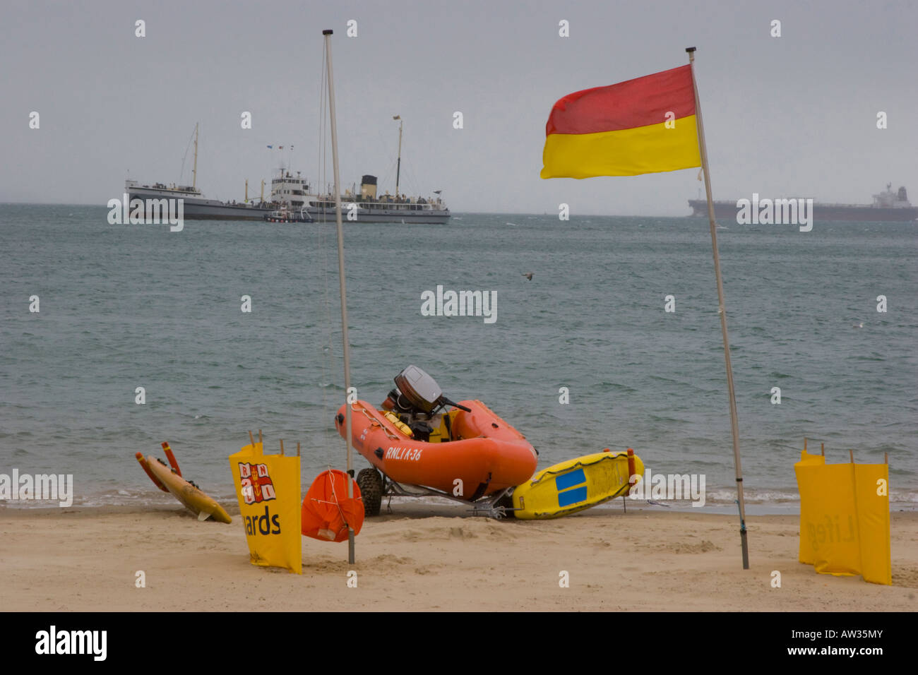 RNLI lifeguards equipment on the beach ships on the horizon Stock Photo ...