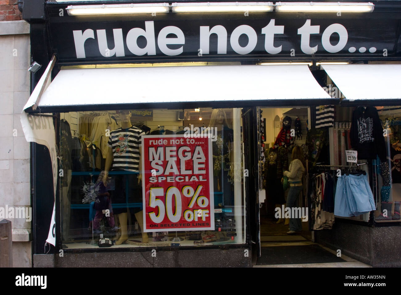 Rude Not To clothes shop window with mega sale Stock Photo - Alamy
