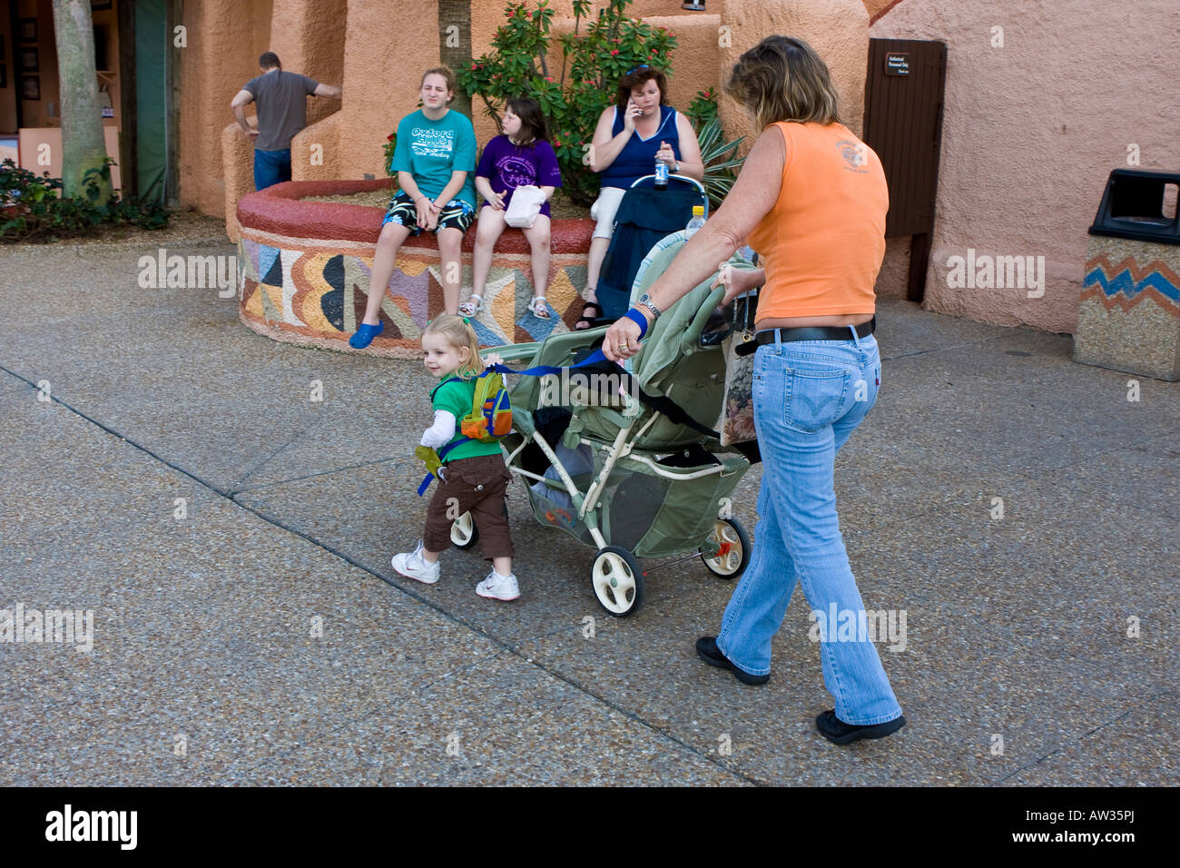Mother Pushing Stroller Stock Photo - Alamy