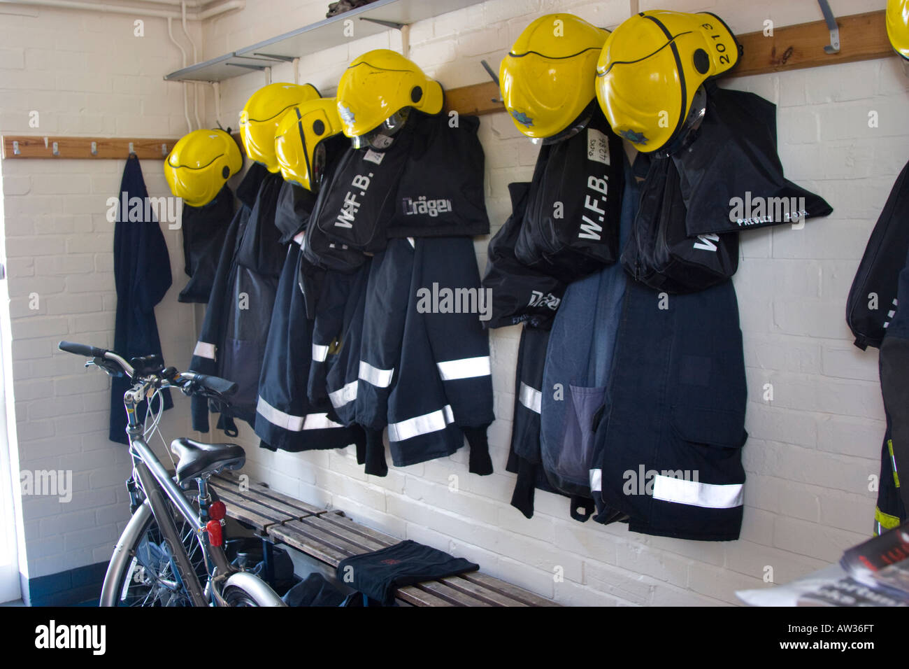 Firefighters uniforms in the station cloakroom Stock Photo - Alamy
