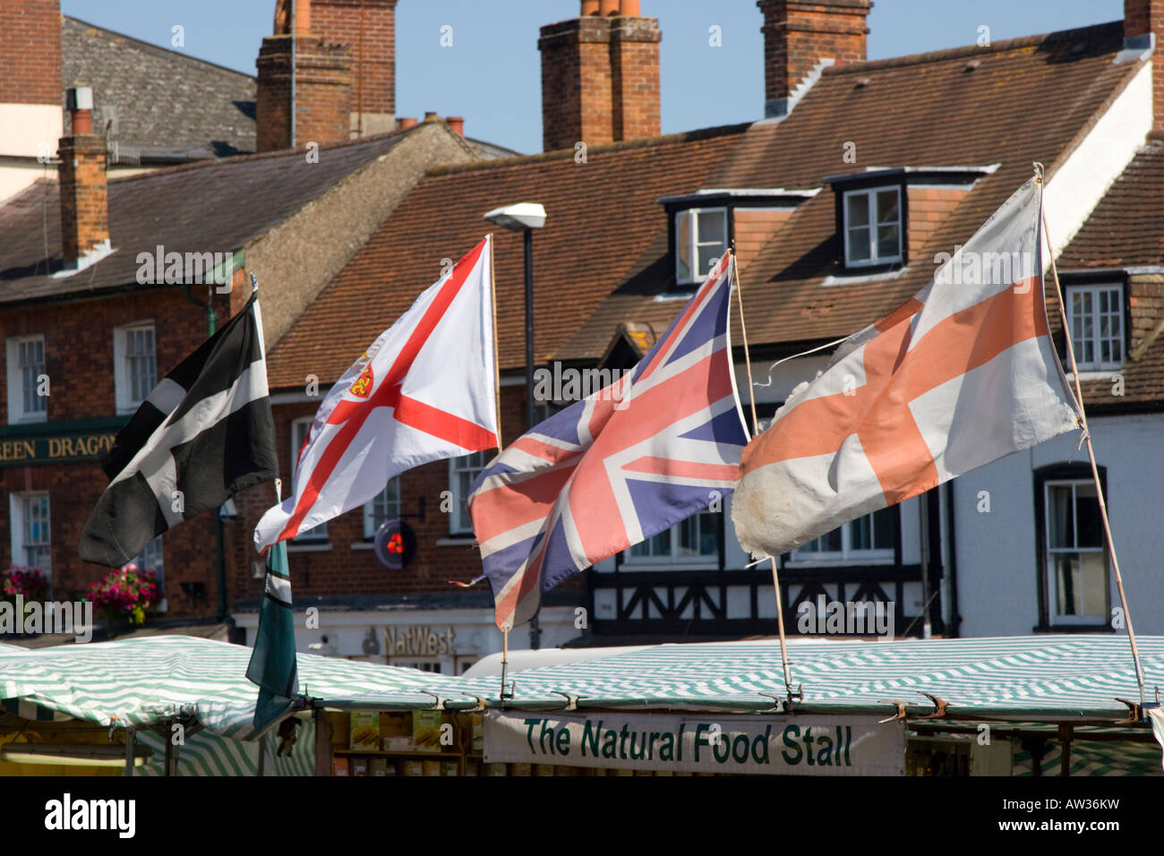 Flags flying above a market traders stall Stock Photo - Alamy