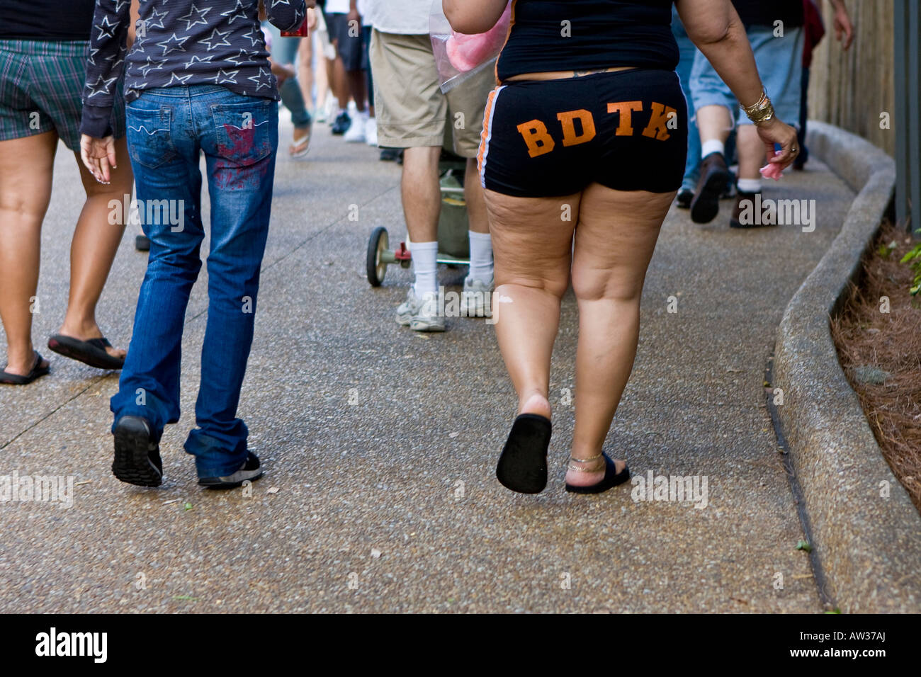 Waist Down View of Heavy Woman Walking Stock Photo - Alamy