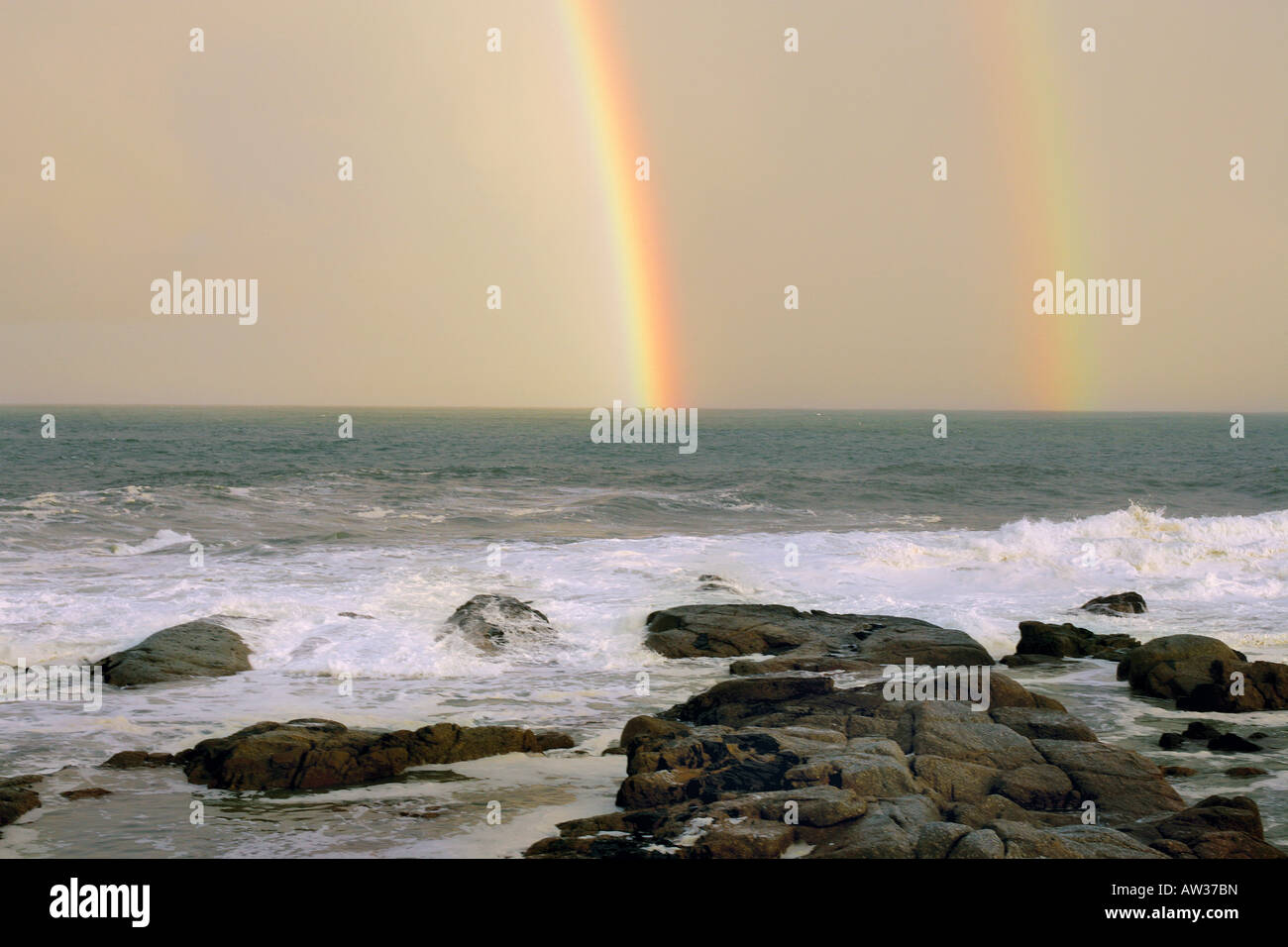 Double Rainbow over the sea Stock Photo - Alamy