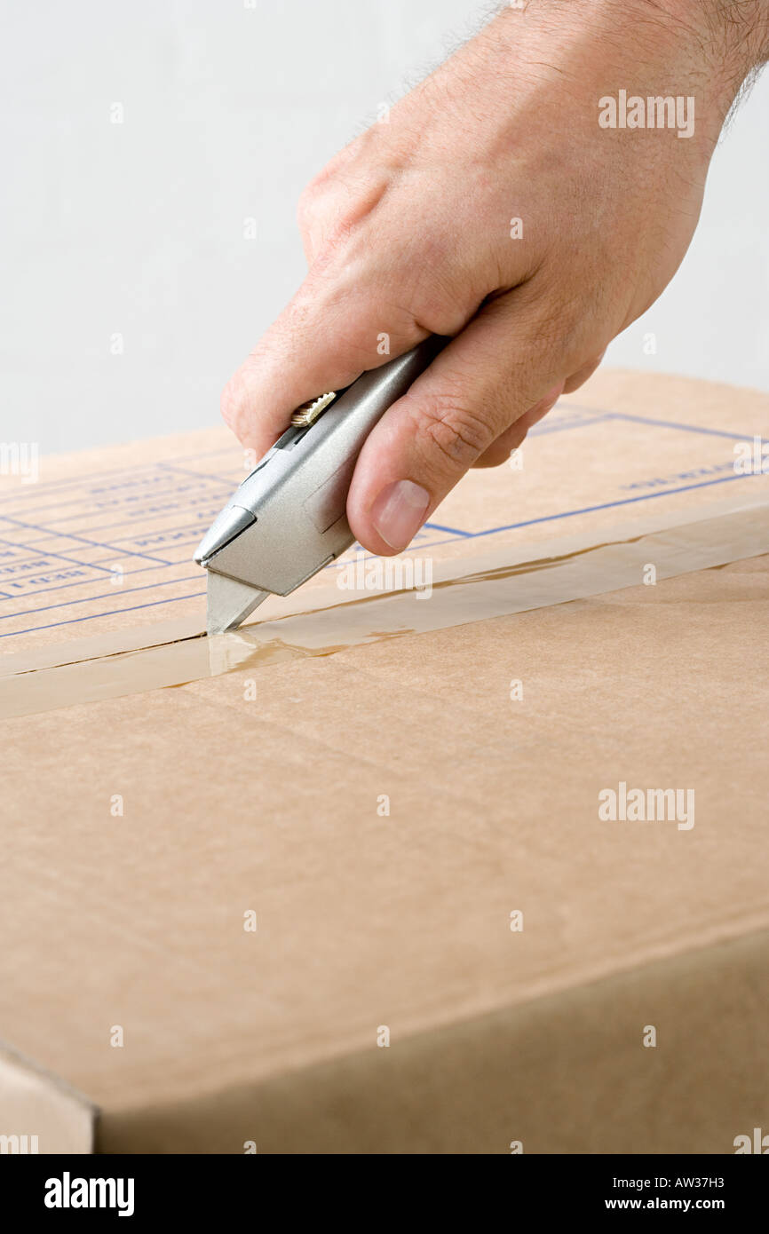 Man opening box Stock Photo - Alamy