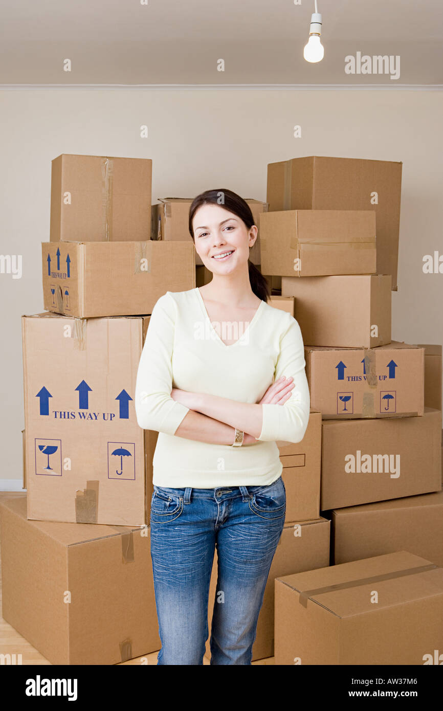 Woman with cardboard boxes Stock Photo - Alamy