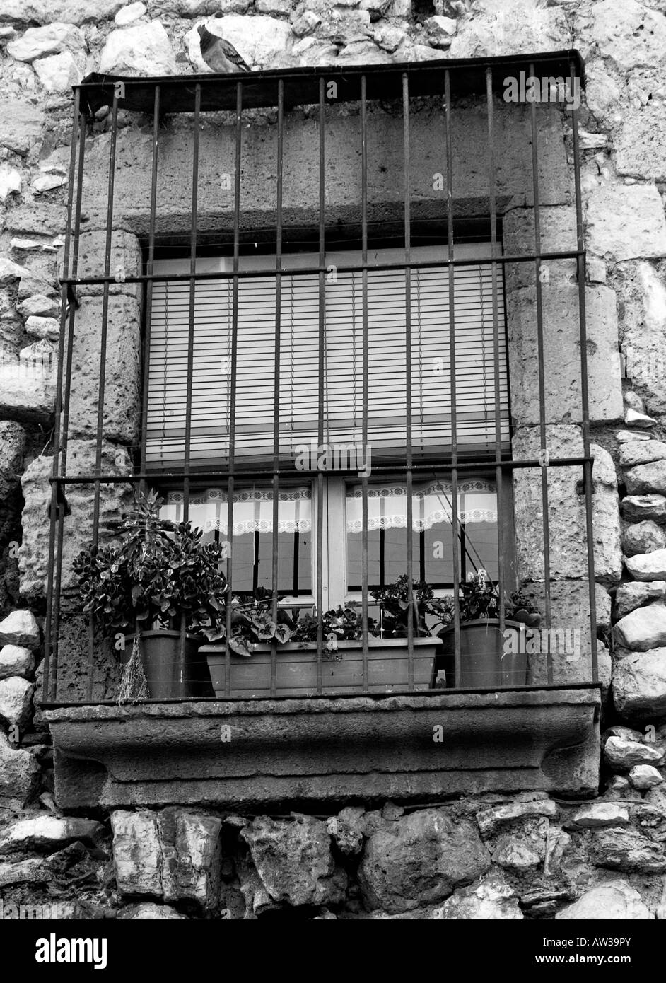 The barred window Stock Photo - Alamy