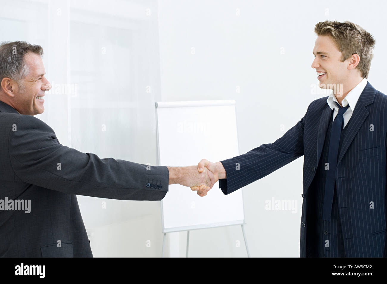 Businessmen asking hands Stock Photo - Alamy