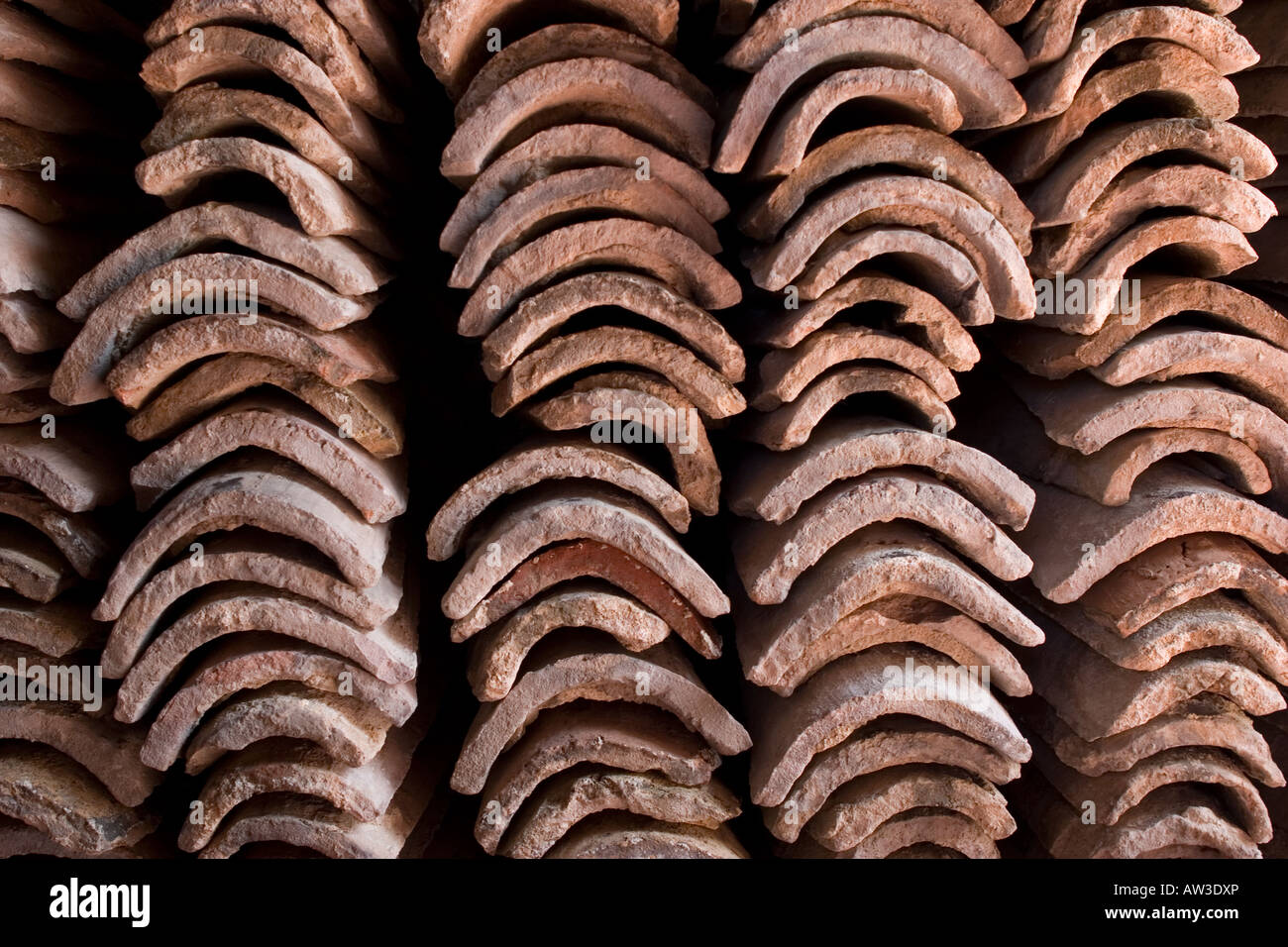 Stacked terracotta roof tiles Stock Photo - Alamy