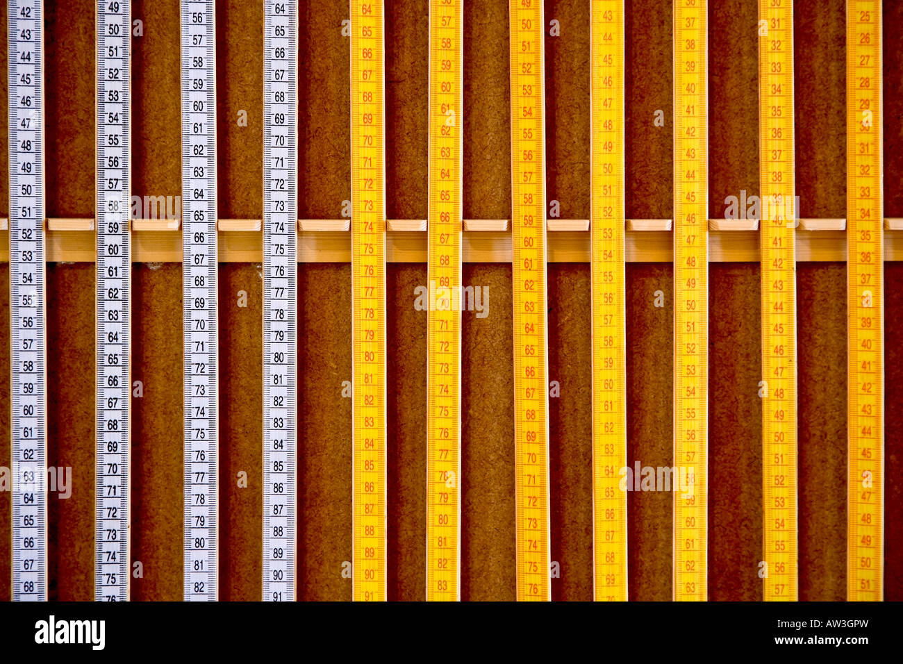 Yellow metric tape hi-res stock photography and images - Alamy