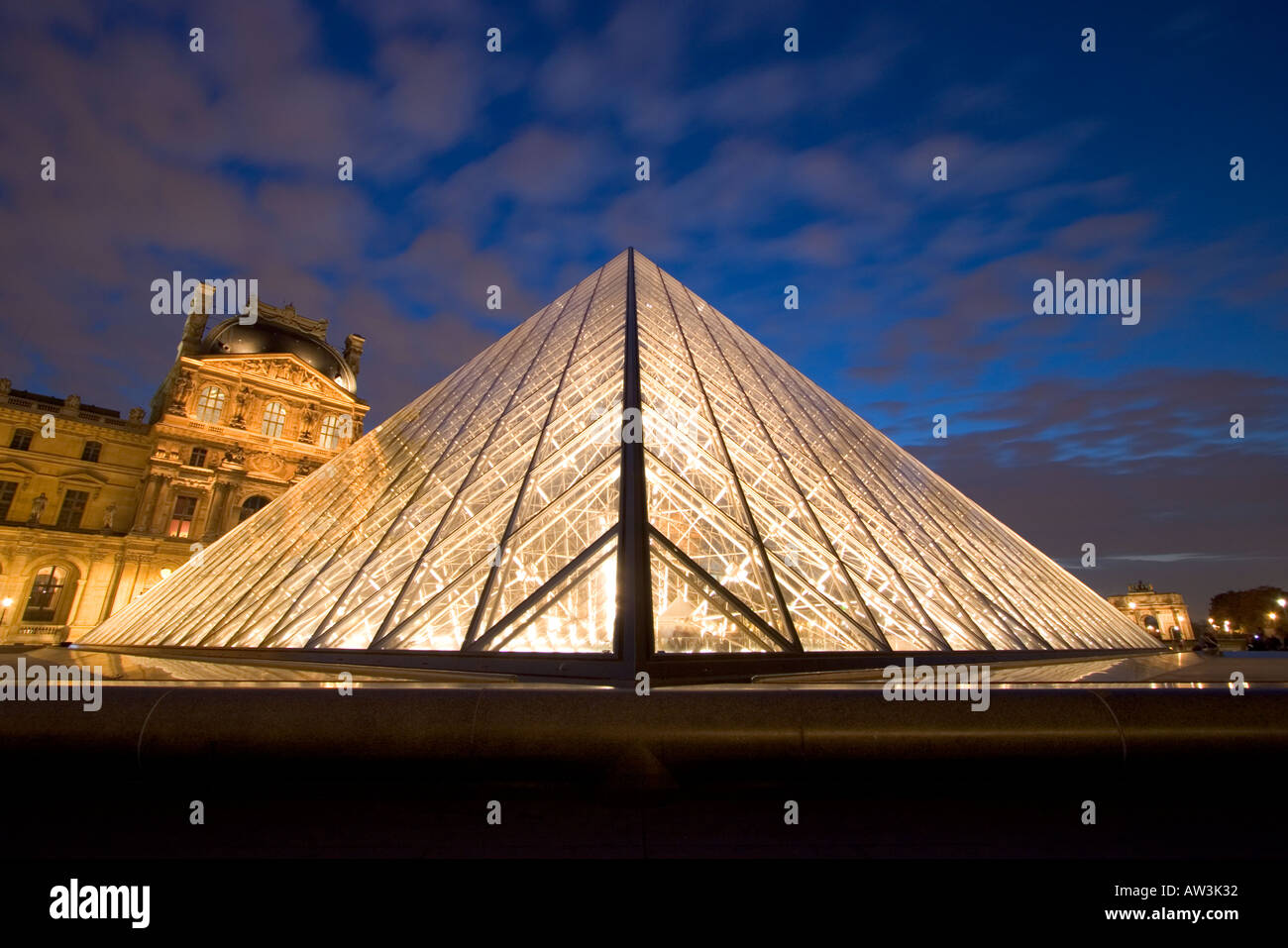 The Louvre and pyramid in Paris, France Stock Photo - Alamy