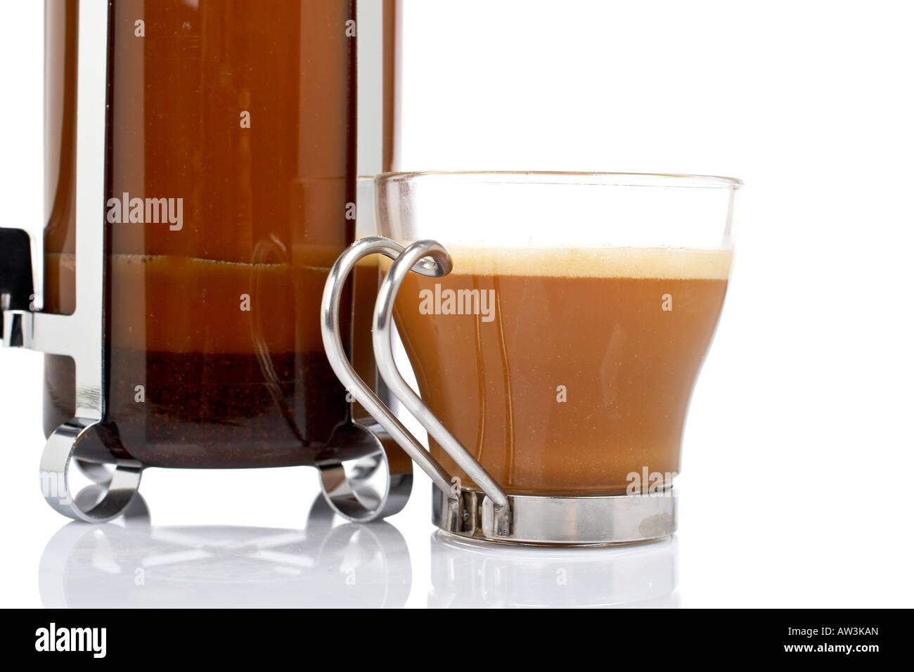 A cup and coffee pot reflected on white background Stock Photo - Alamy