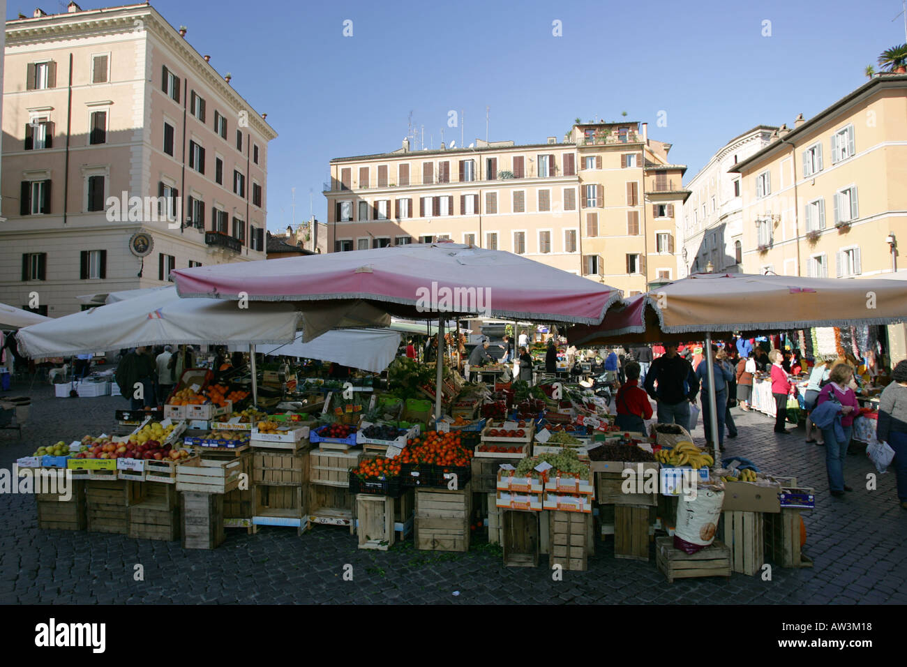Traditional pastel painted buildings and ancient market stalls in ...