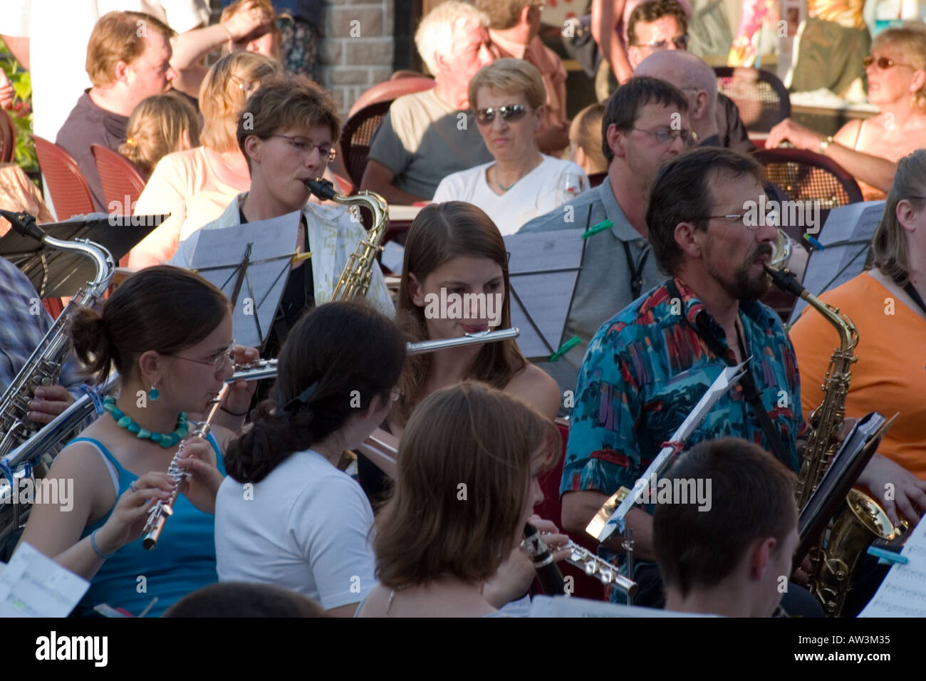 Playing flute street crowd hi-res stock photography and images - Alamy