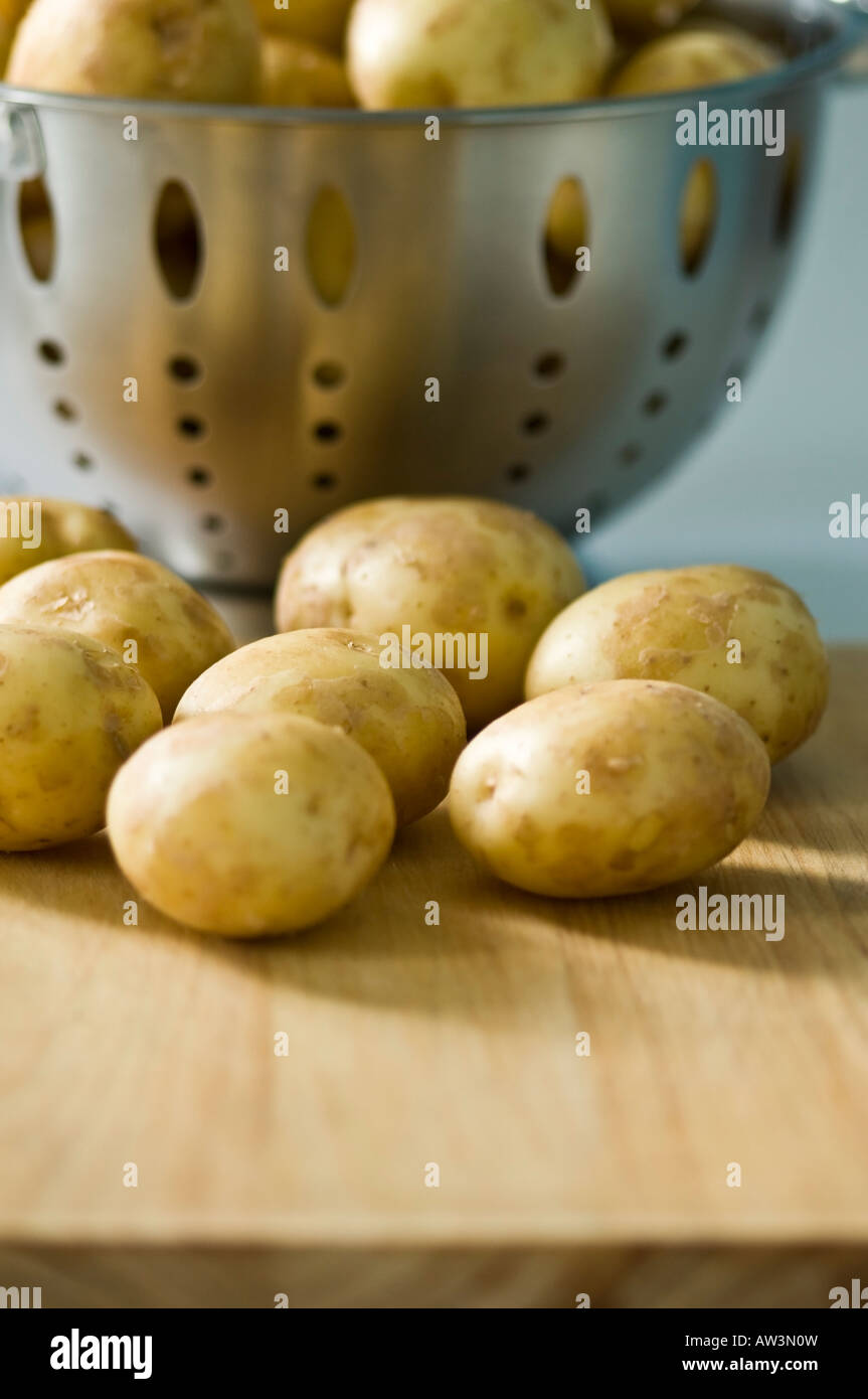 New potatoes in colander food close-up Stock Photo - Alamy