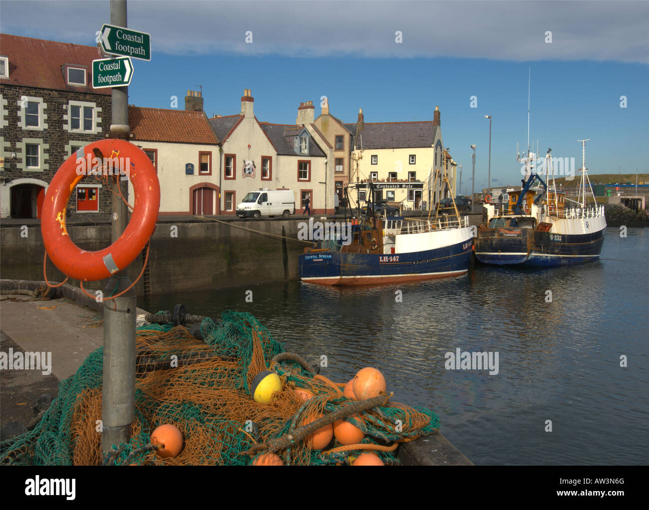 Eyemouth harbour fishing boats coastal path sign east coast Scottish ...