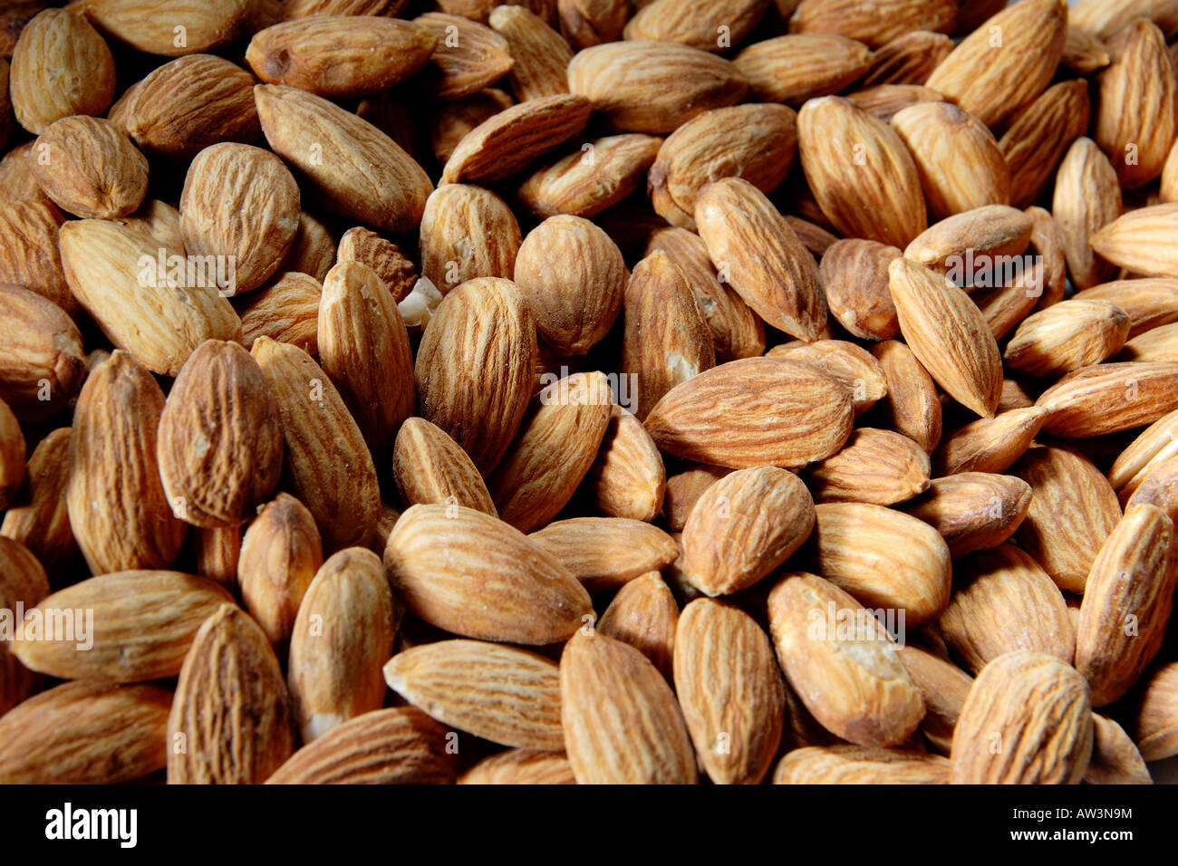 Close up photo of fried nuts texture Stock Photo - Alamy