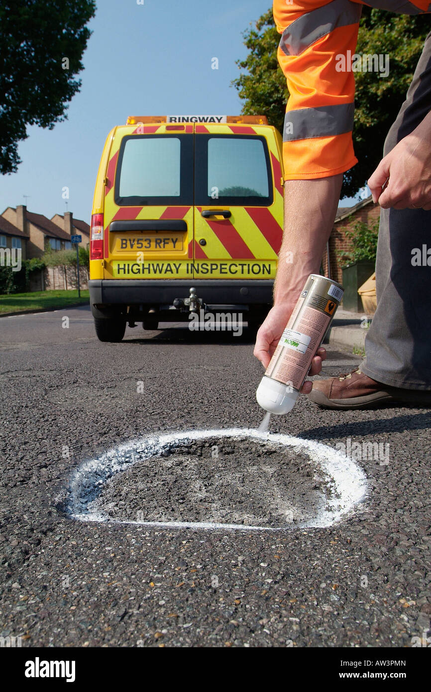 Council highway inspection for defects Stock Photo - Alamy