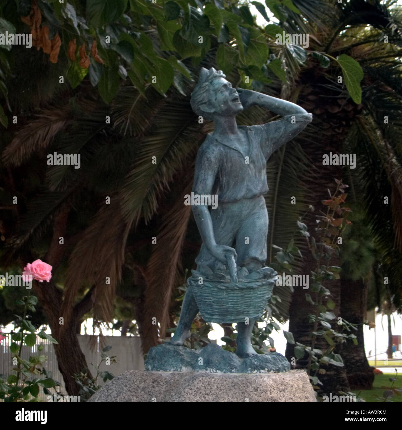 Statue of boy fish seller at Cambrils, Costa Dorada, Catalonia Spain ...