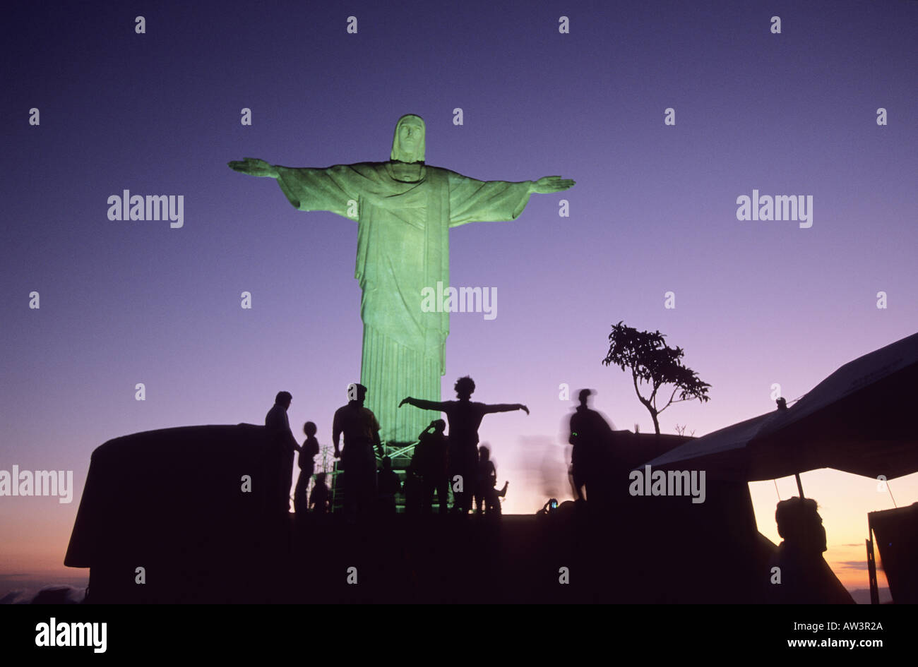 Tourists visiting the Christ (Corcovado) statue set high above the city ...