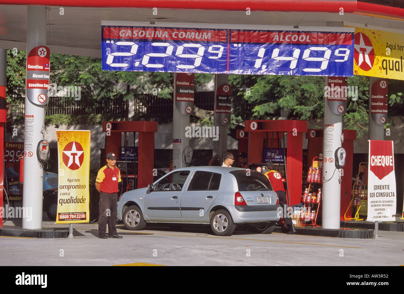 A car filling up at a petrol staion with alcohol (alcol) made from ...