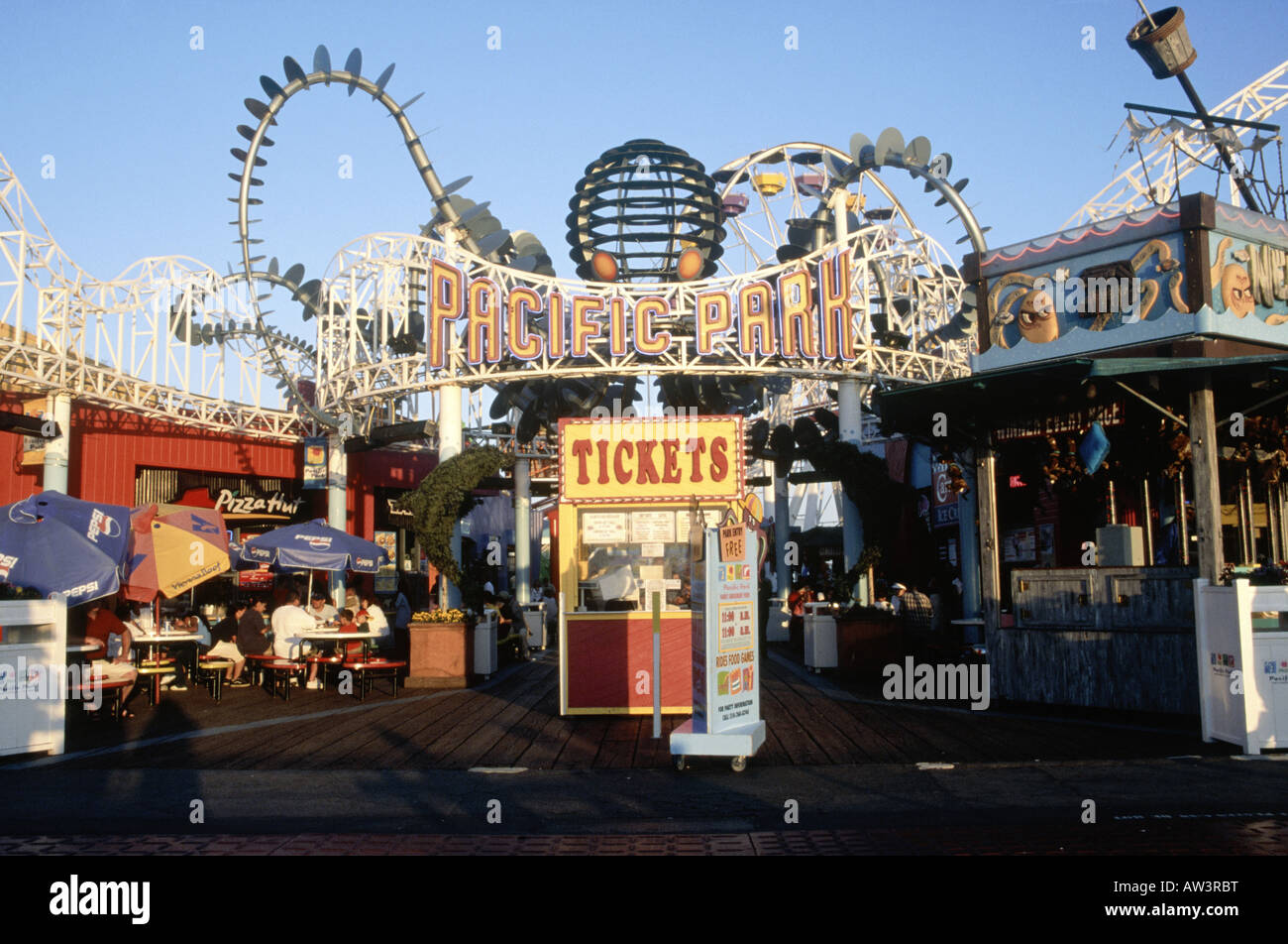 Pacific Park Entertainment funfair Signs rides People at cafe Theme ...