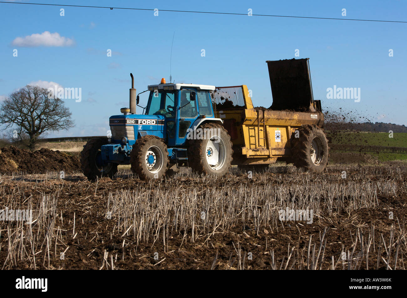Ford 8210 Tractor Muck Spreading Stock Photo - Alamy