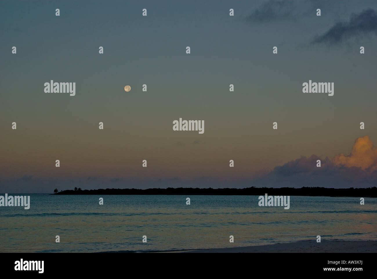 Moonset over Calabash Bay on Galliot Cay off Long Island in the Bahamas ...