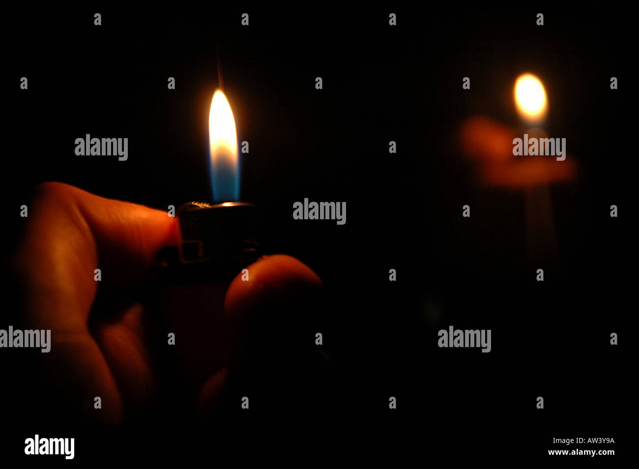 hand holding lighter Stock Photo - Alamy