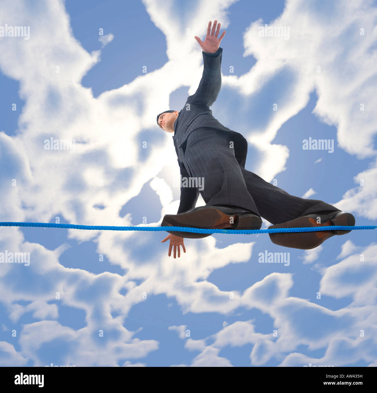 Young businessman walking on line in the air Holding balance Low angle ...