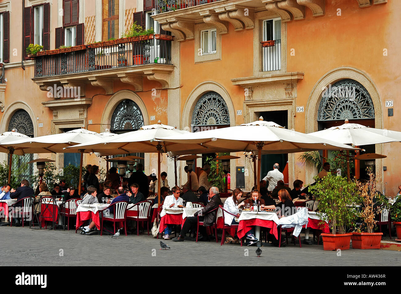 Tourists in a cafe along Rome Streets, Italy Stock Photo - Alamy