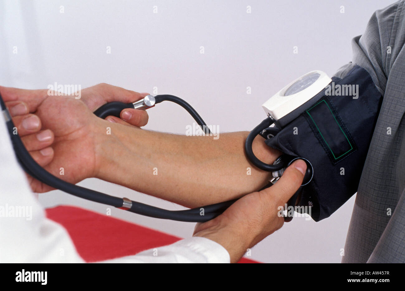 Taking blood pressure Stock Photo - Alamy