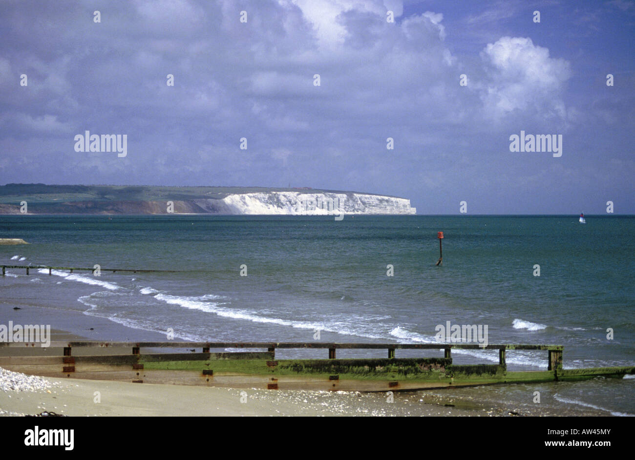 Coast View along beach To white chalk cliffs Sand Breakwaters Waves ...
