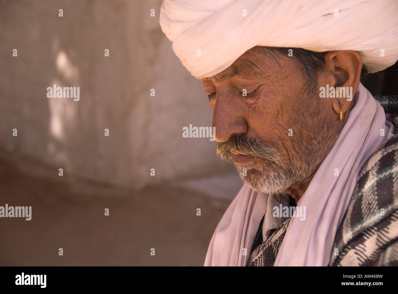Indian man earring hi-res stock photography and images - Alamy