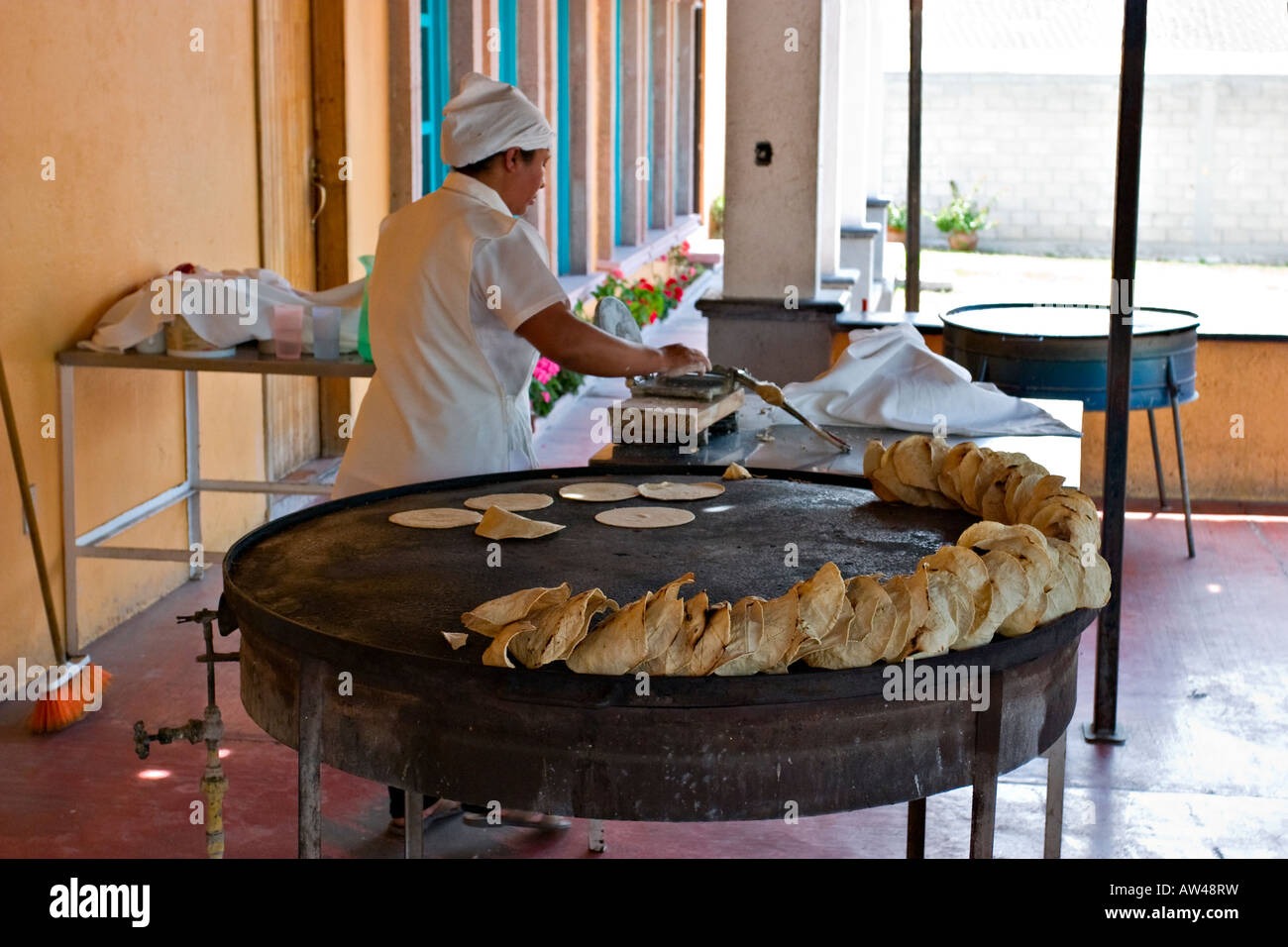 Mexican woman making tortillas hi-res stock photography and images - Alamy