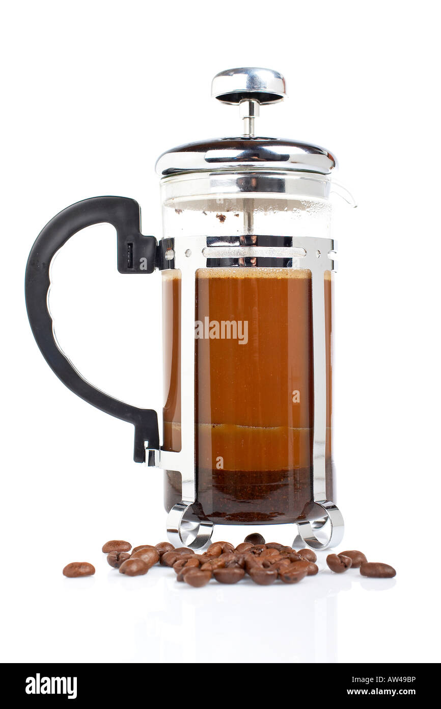 A coffee pot with beans reflected on white background Stock Photo - Alamy