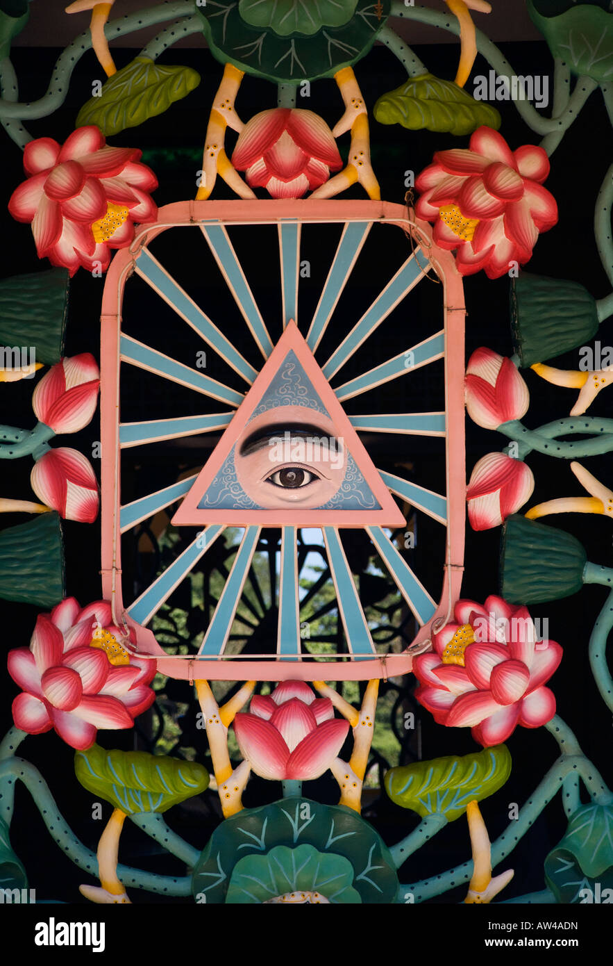 A window display depicting the DIVINE EYE at the CAO DAI GREAT TEMPLE ...