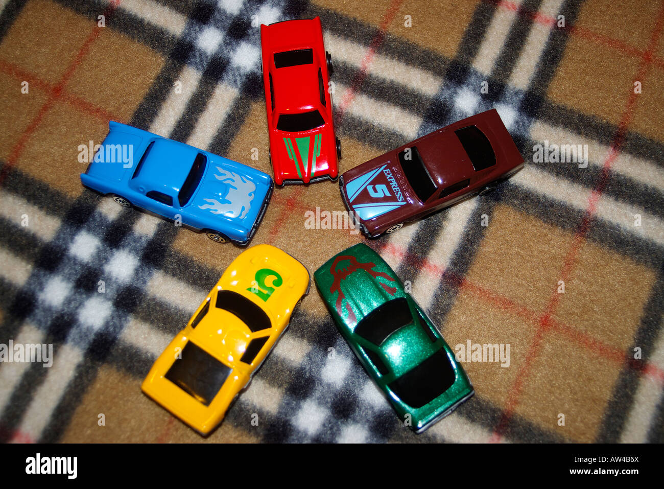 Set of five toy cars Stock Photo - Alamy