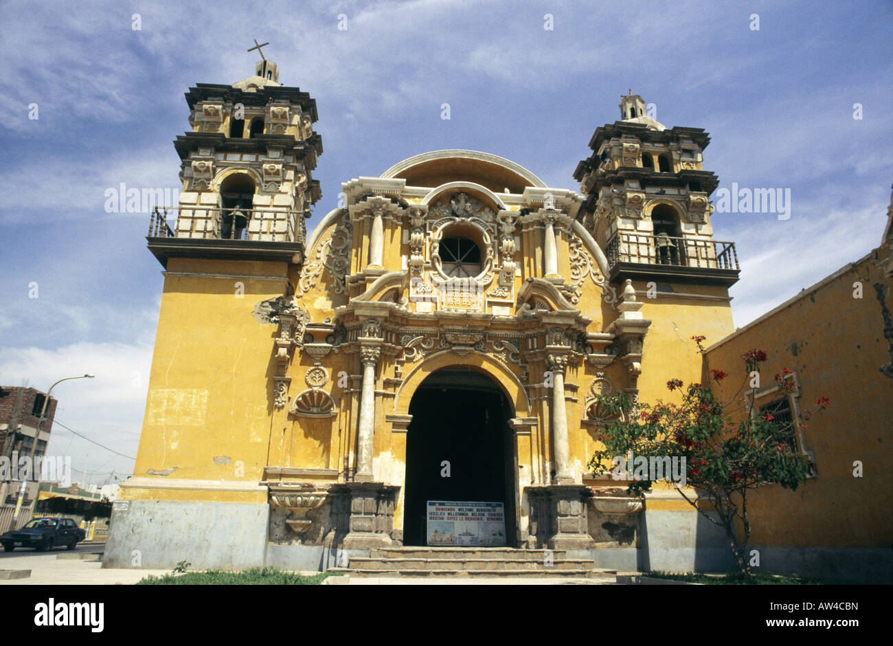 Church facade, Colonial style towers Yellow painted plaster wall Stock ...