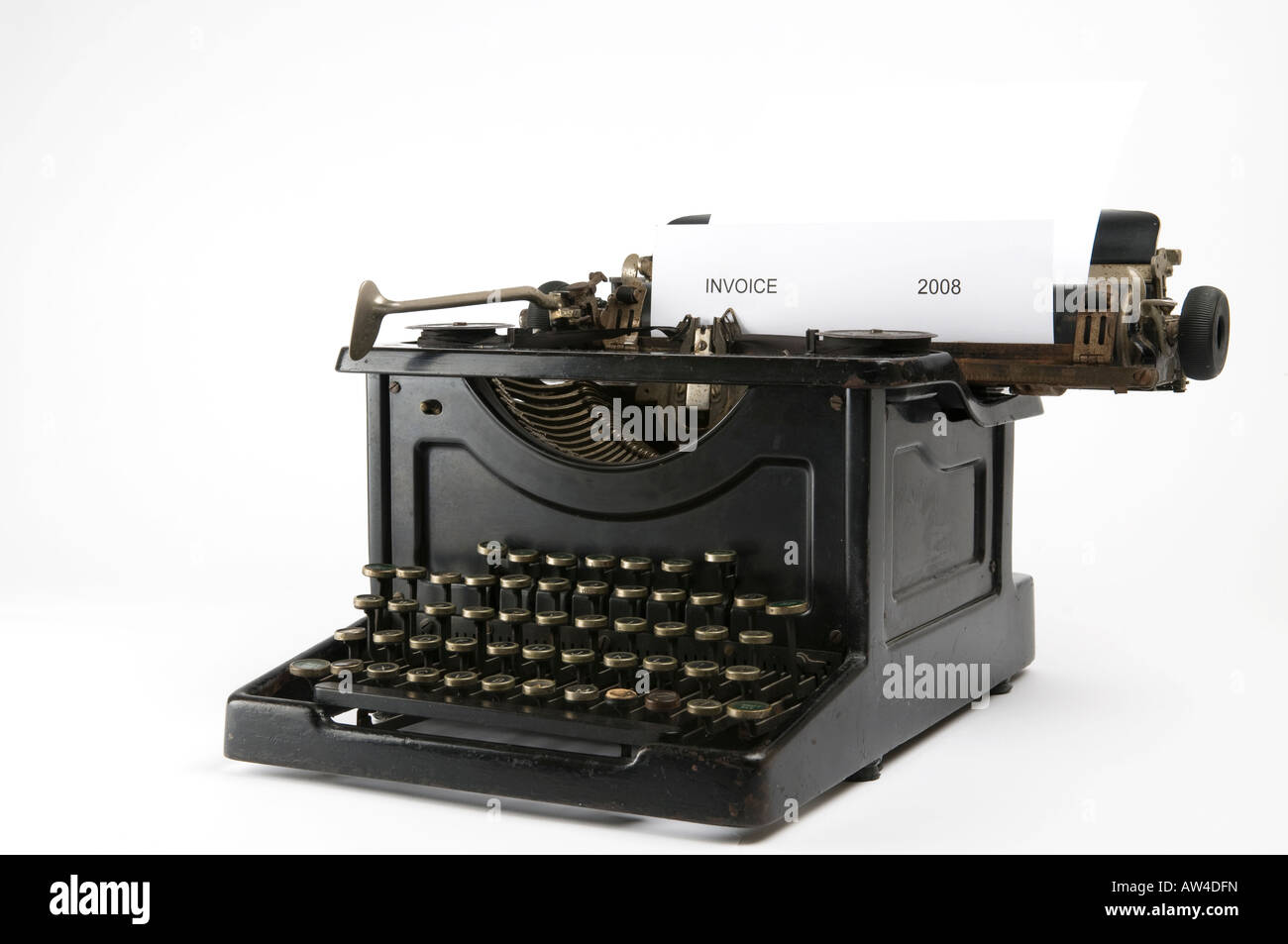 An old ancient typewriter used to write an invoice Font used is Arial ...
