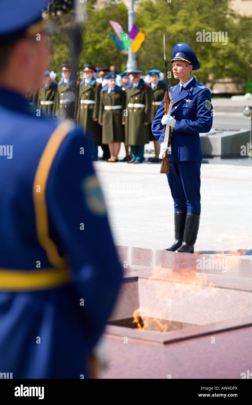 Soldiers standing guard at the war memorial monument in Victory Square ...
