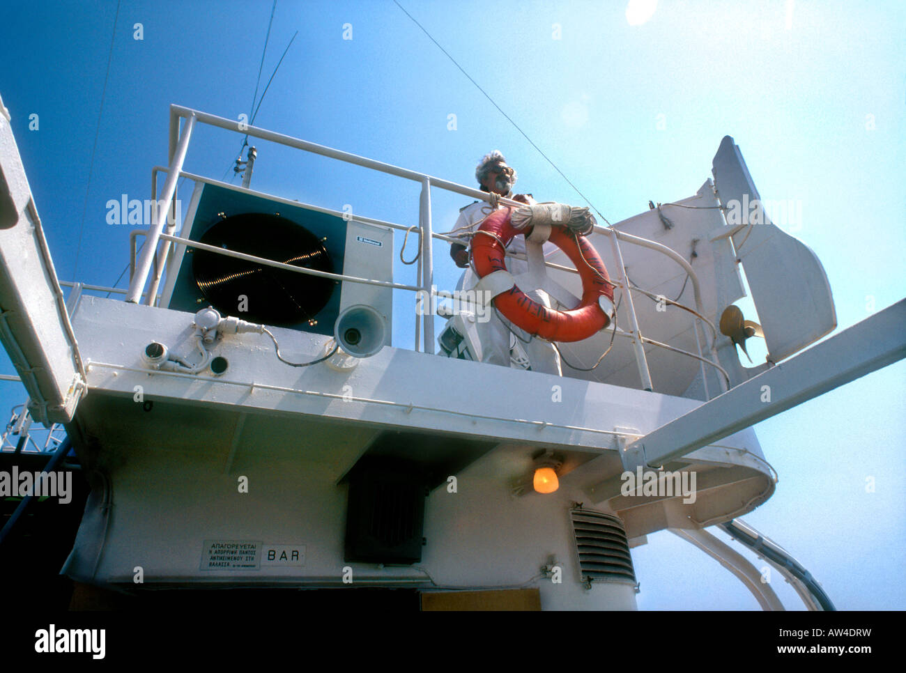 Ship captain on top desk of Greek Ferry from Crete to Santorini Stock ...