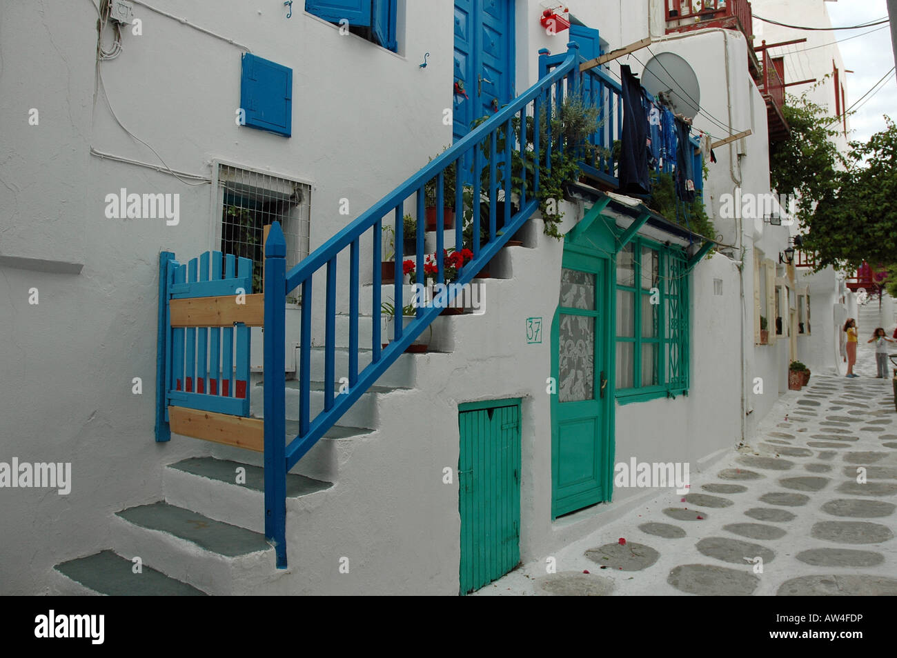 Cobblestone walkways in Mykonos Greece Stock Photo - Alamy