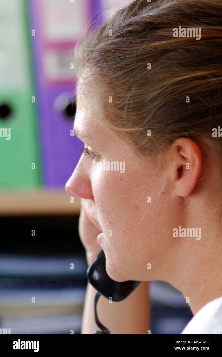 Answering the telephone hi-res stock photography and images - Alamy