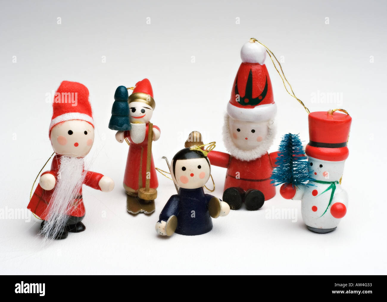 Christmas wooden characters on a white background Stock Photo - Alamy