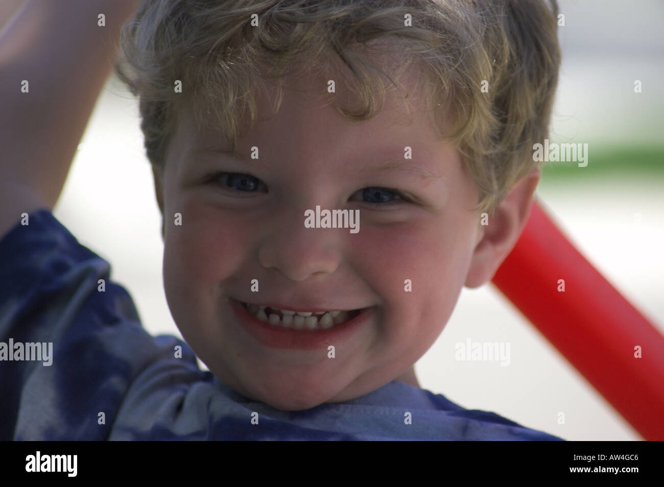 young boy with big smile Stock Photo - Alamy
