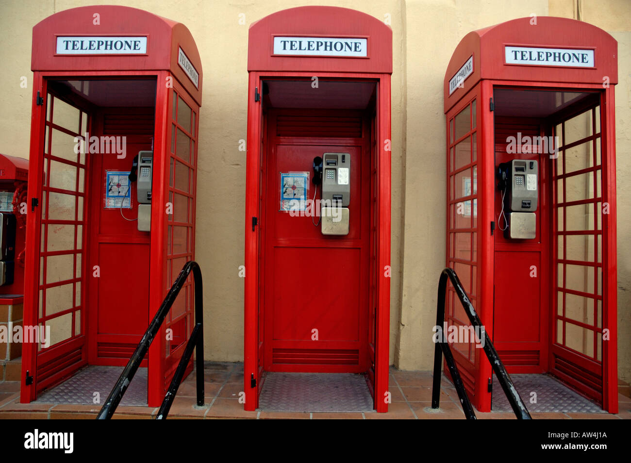 Three old-fashioned public telephone boxes in Gibraltar, British ...