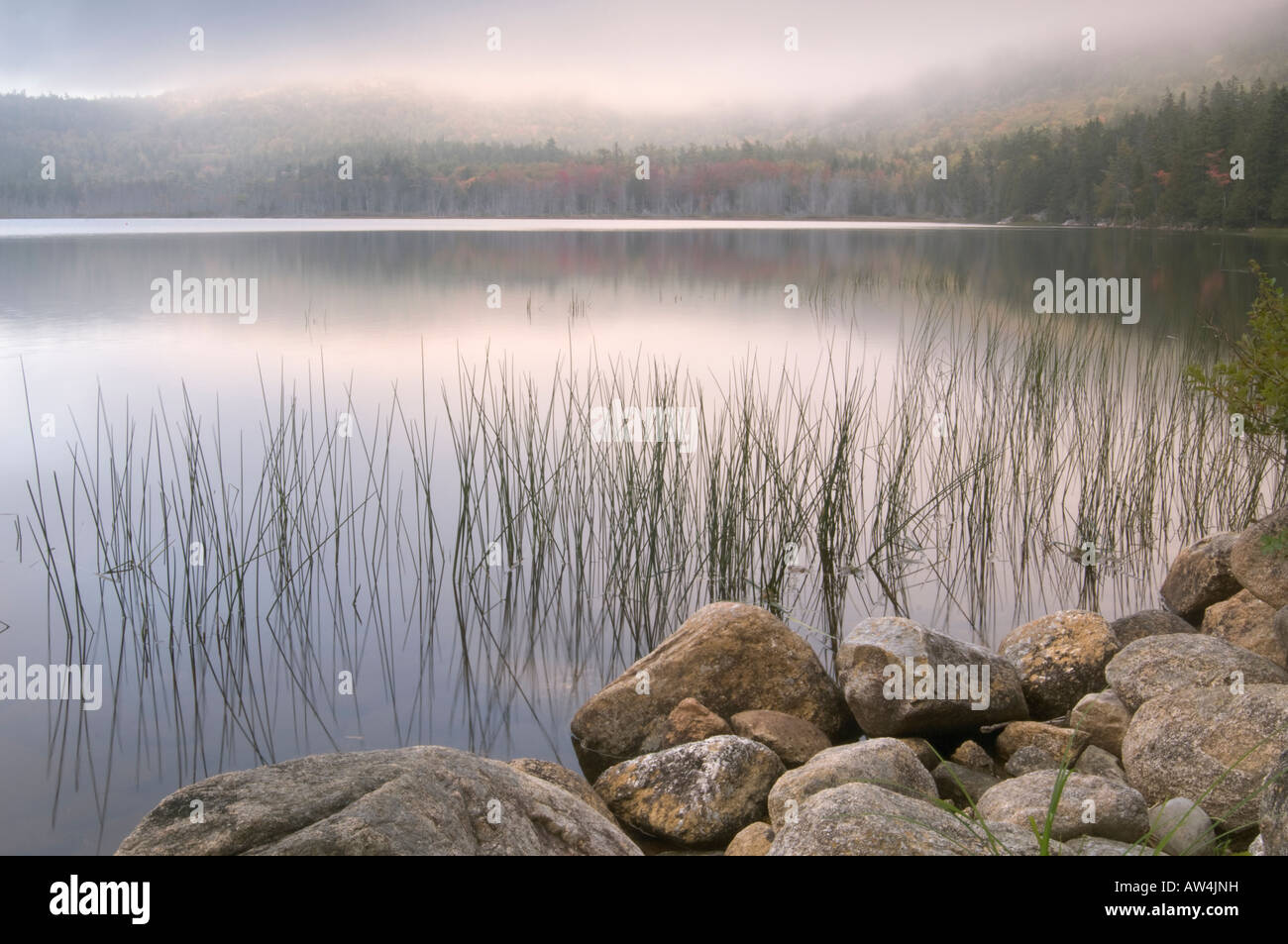 Sunset through fog over Upper Hadlock Pond looking toward Bald Peak ...